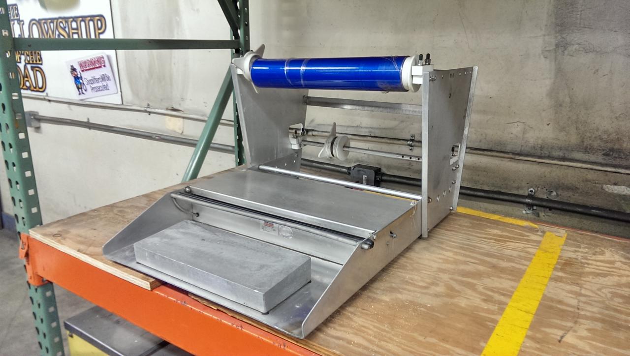 Lot #22: HeatSeal 825A Table Top Wrapper - WireBids